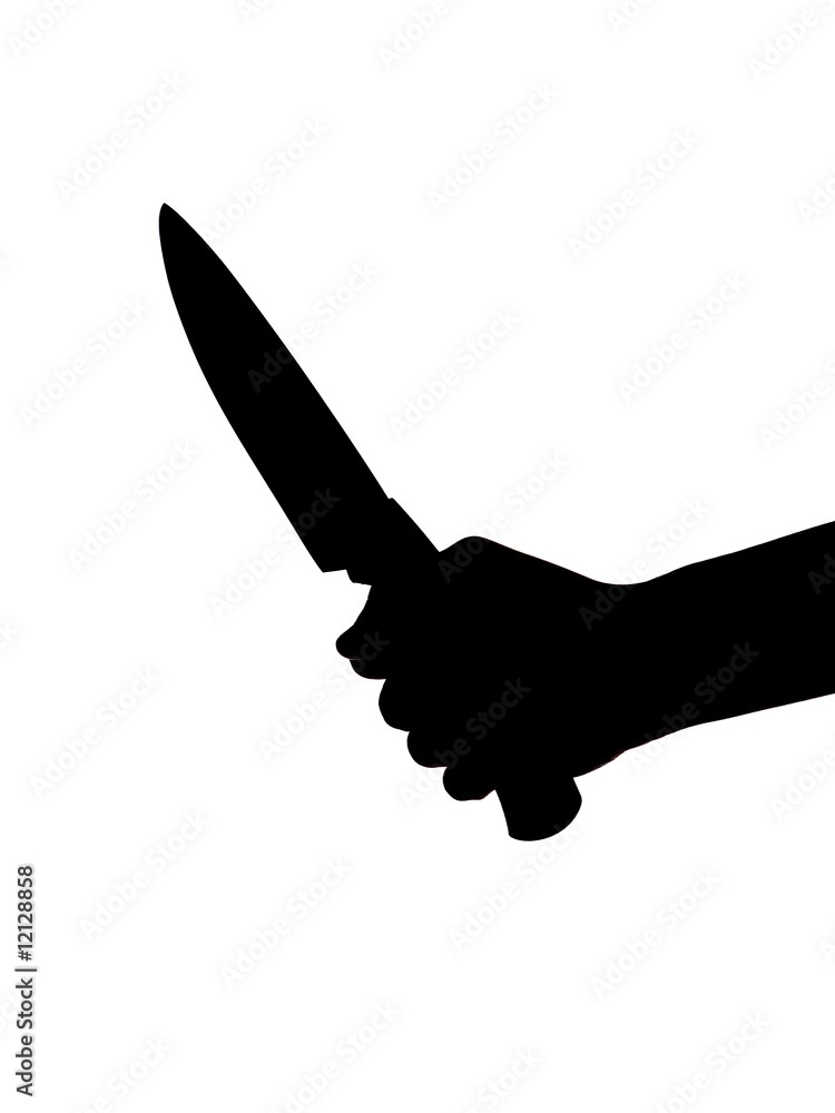 Silhouette og an hand holding a kitchen knife Stock Photo | Adobe Stock