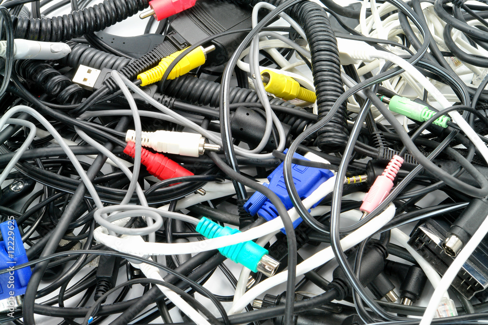 CABLES ARE ENTANGLED IN A COMPLETE MESS Stock Photo | Adobe Stock