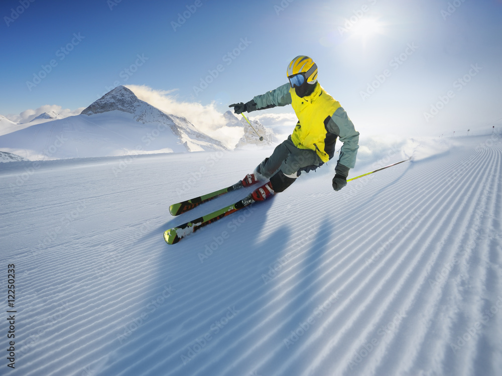 Skier in high mountains Stock Photo | Adobe Stock