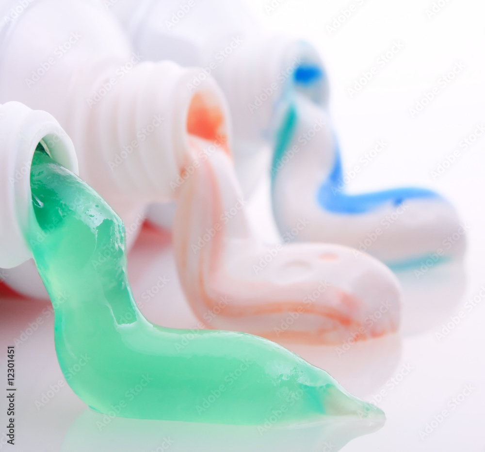 Coloured toothpaste coming out of a tube Stock Photo | Adobe Stock