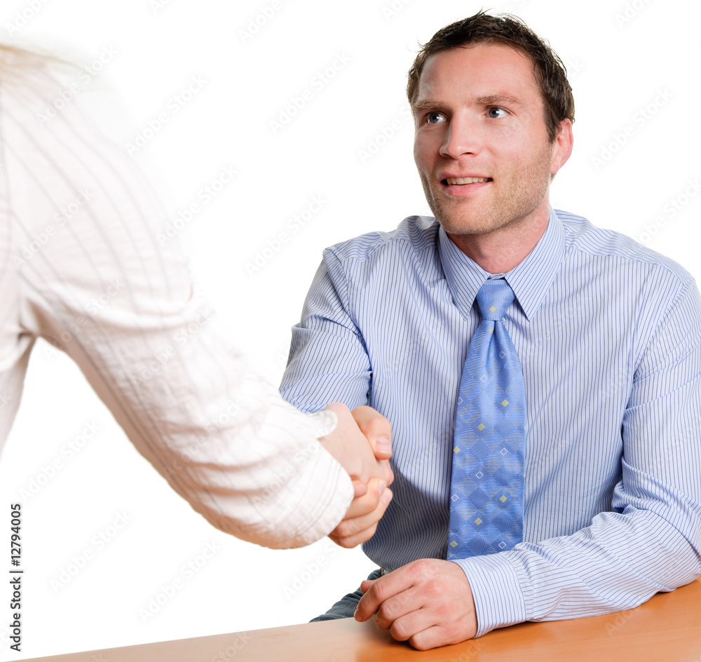 Mann und Frau geben sich die Hand Stock-Foto | Adobe Stock