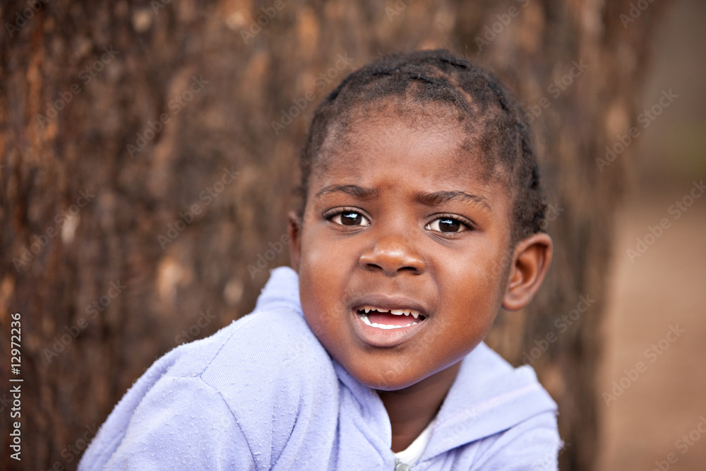 scared african child Stock Photo | Adobe Stock