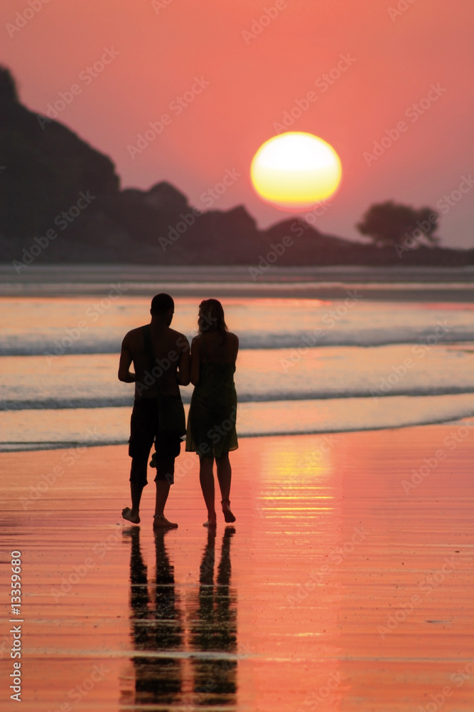 couple and sunset Stock Photo | Adobe Stock