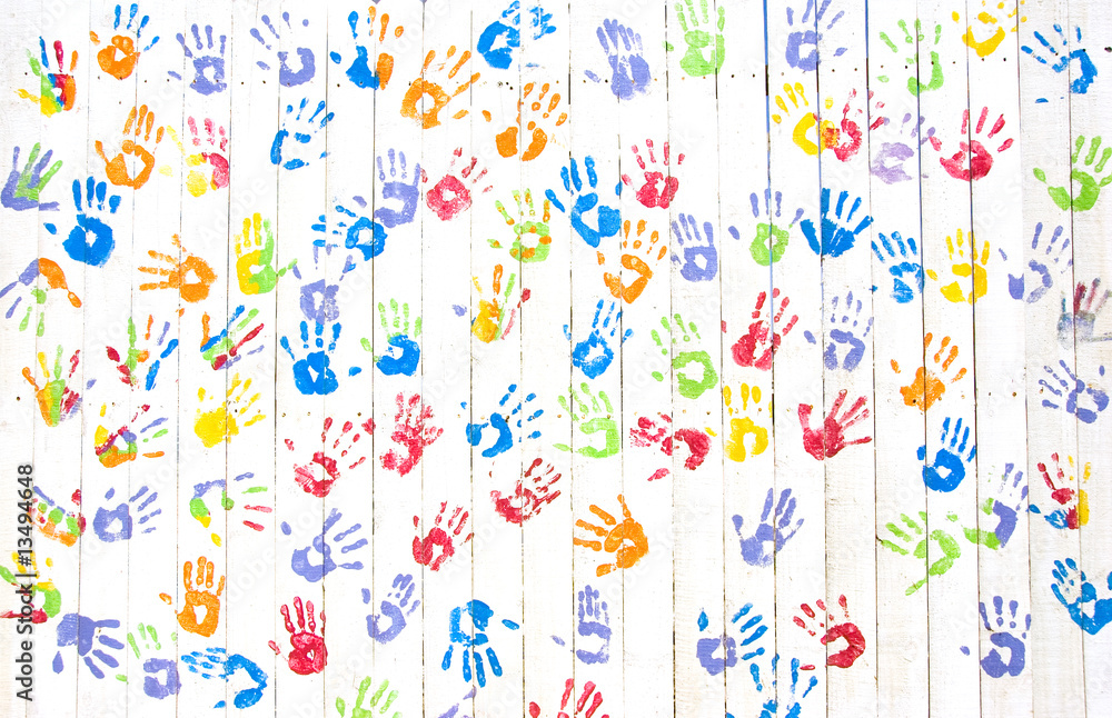 Colorful handprints on a wall Stock Photo | Adobe Stock