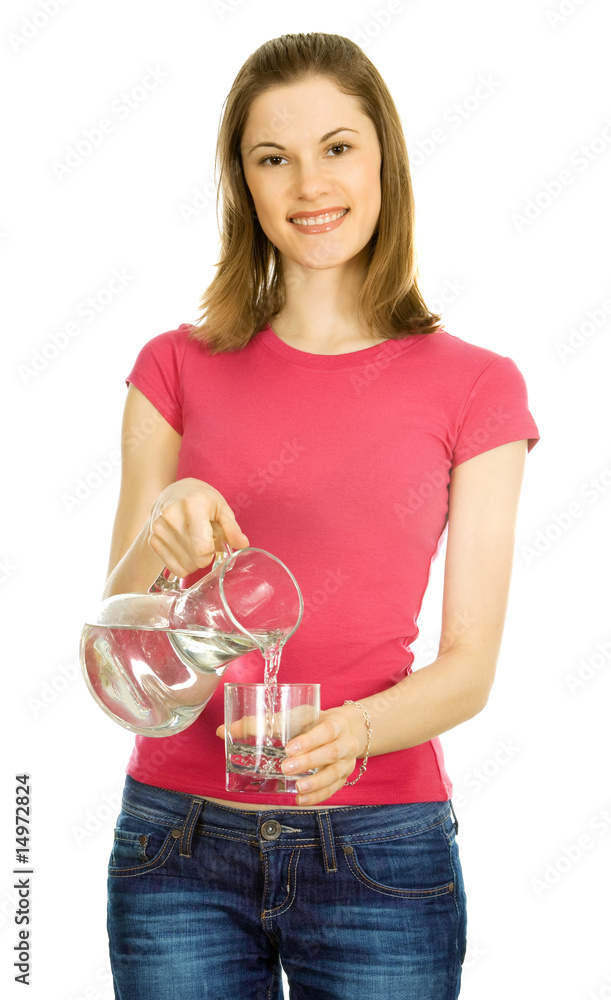 Beautiful girl pouring water into a glass. Isolated on white Stock Photo | Adobe Stock