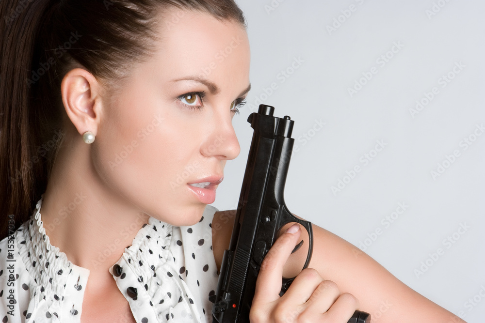 Foto De Sexy Woman With Gun Do Stock Adobe Stock