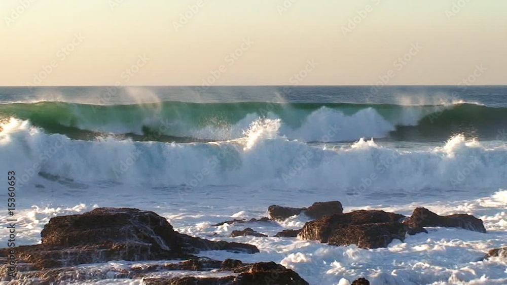 Vídeo do Stock: Big waves against rock in the beach | Adobe Stock