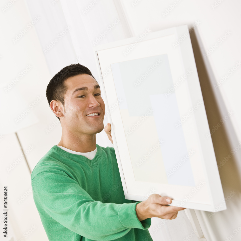 Asian male hanging art Stock Photo | Adobe Stock