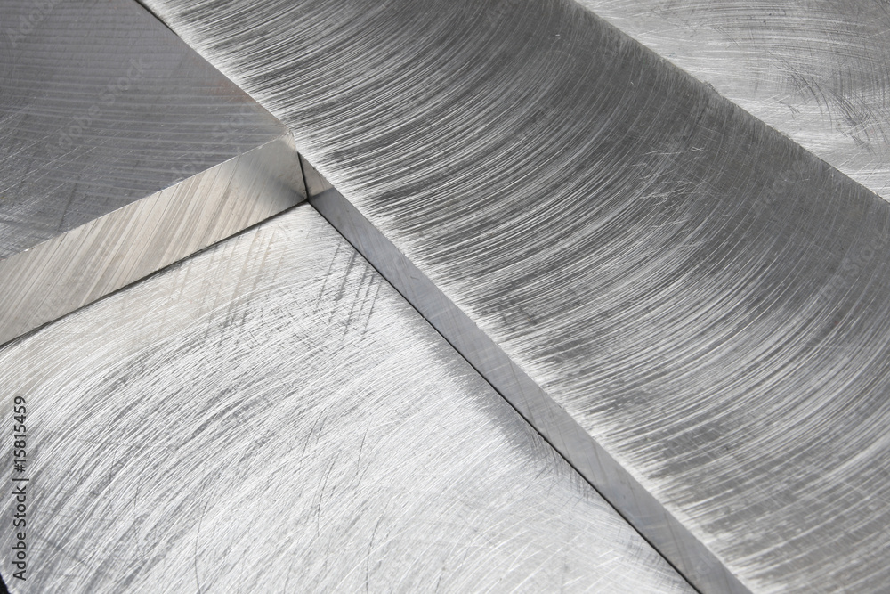 Machined metal blocks at an angle Stock Photo | Adobe Stock