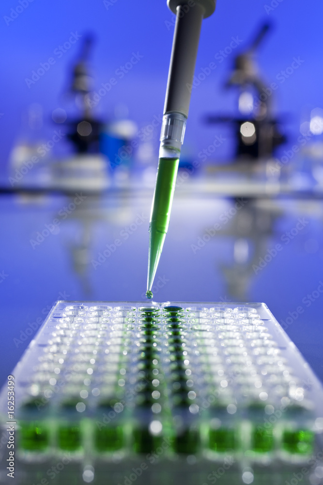 Green Solution Scientific Research With a Pipette and Cell Plate Stock ...