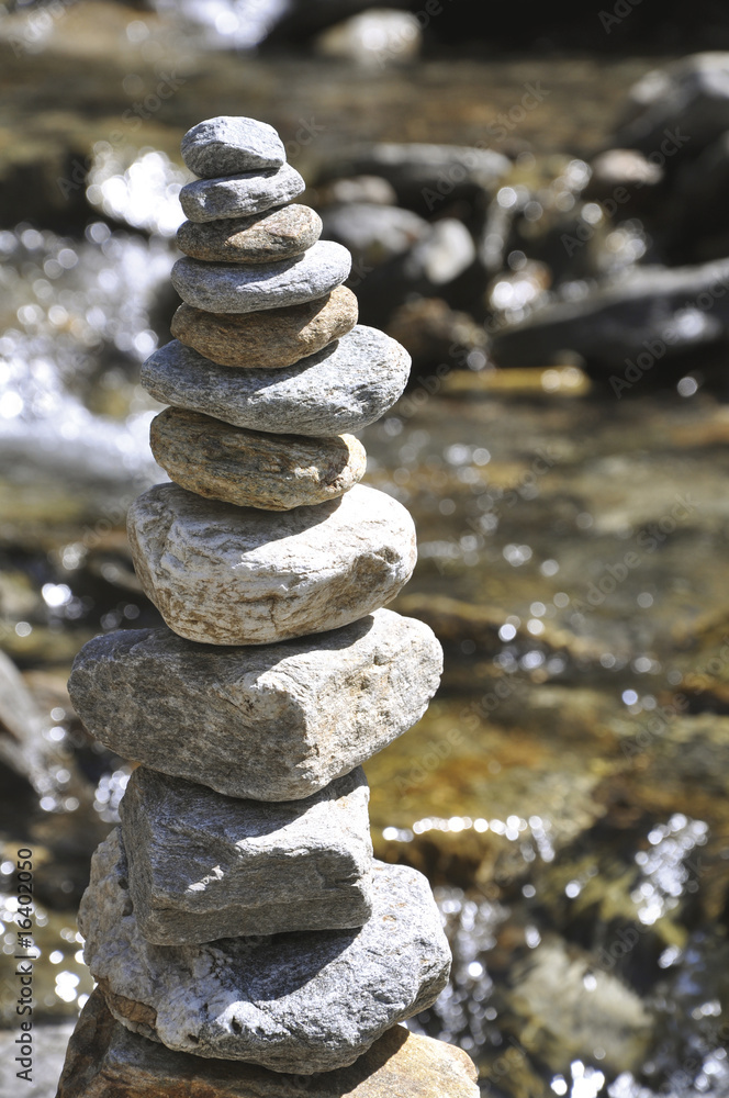 Steinskulpture im Fluss Stock Photo | Adobe Stock