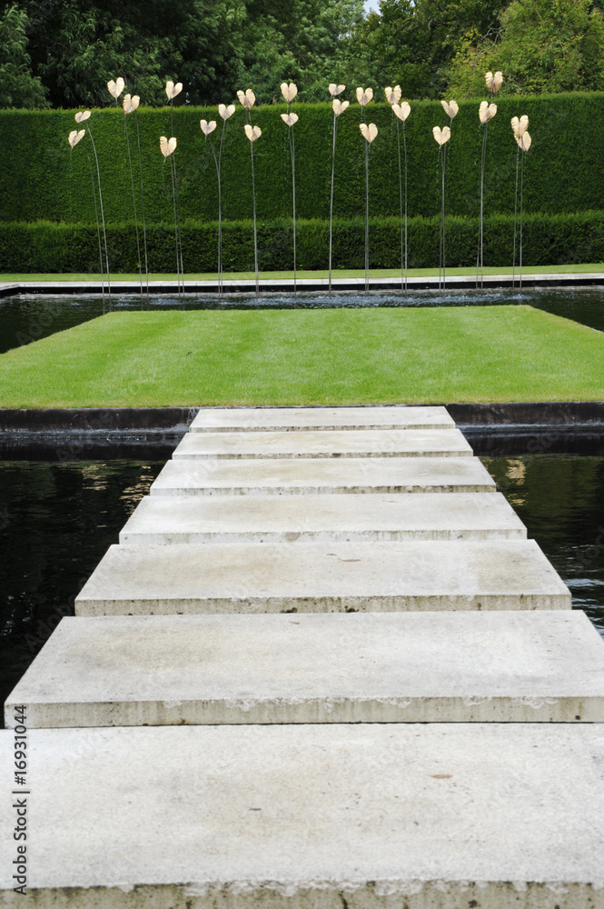 Path to golden leaf water feature Stock Photo | Adobe Stock
