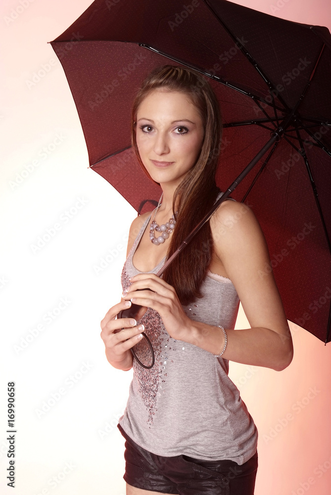 Mädchen mit Schirm Stock-Foto | Adobe Stock