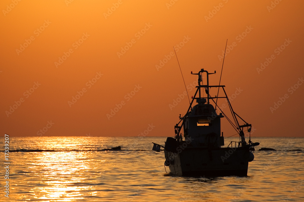 peschereccio all'alba Stock Photo | Adobe Stock