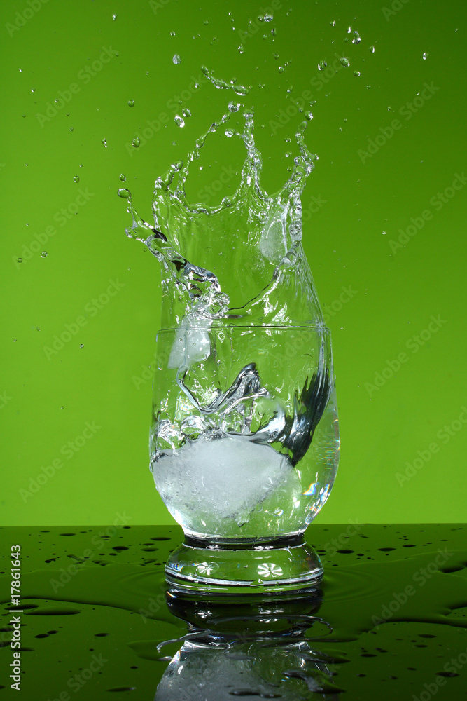 water splash in Oster, green background Stock Photo | Adobe Stock