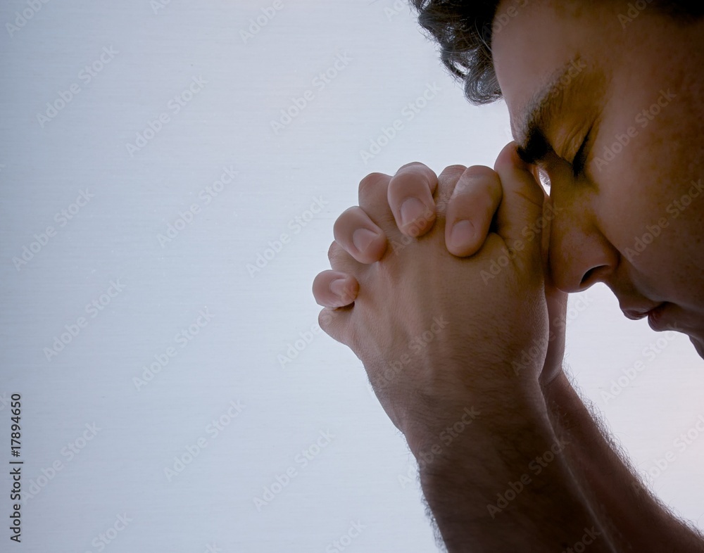 Hombre rezando foto de Stock | Adobe Stock