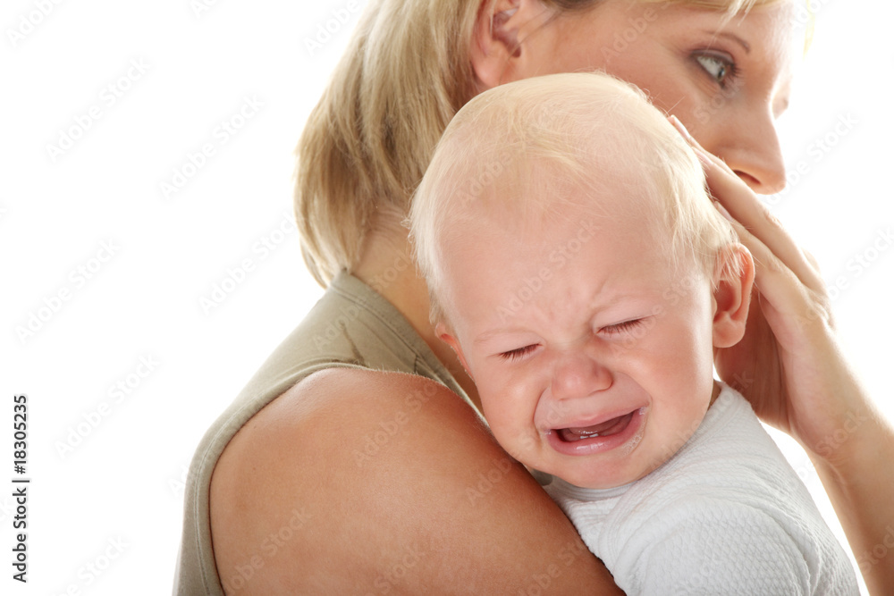 Mother holding her crying baby isolated Stock Photo | Adobe Stock