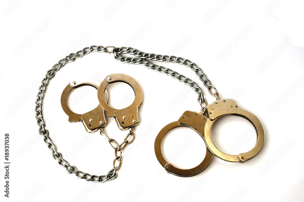 Set of metal wrist and ankle cuffs Stock Photo | Adobe Stock