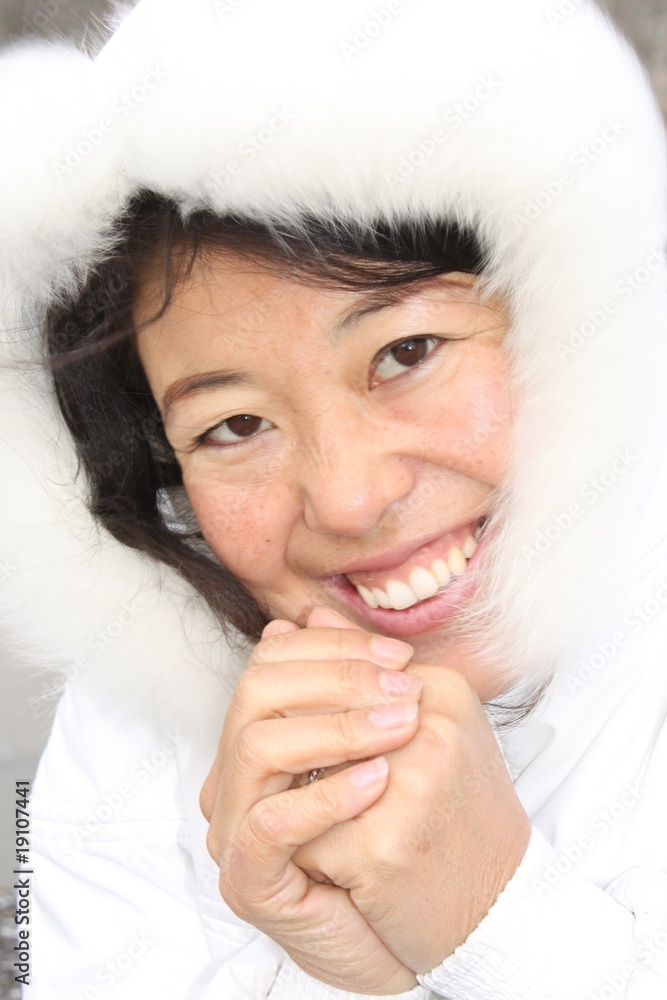 Chinese winter girl wearing white coat Stock Photo | Adobe Stock