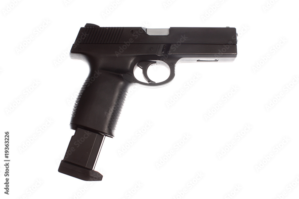 A semi-automatic pistol with an extended magazine. Stock Photo | Adobe ...