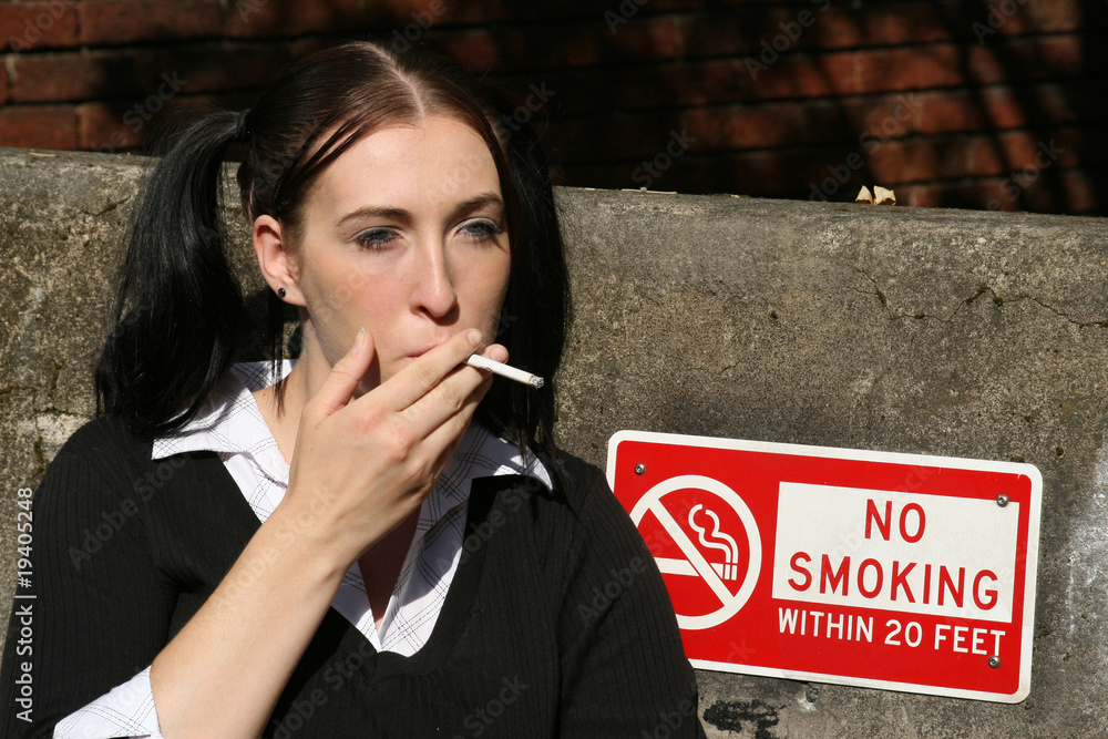 Schoolgirl smoking cigarette Stock Photo | Adobe Stock
