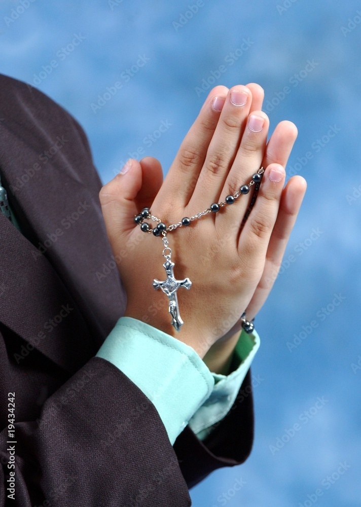 Praying Hands Holding Rosary Stock Photo | Adobe Stock