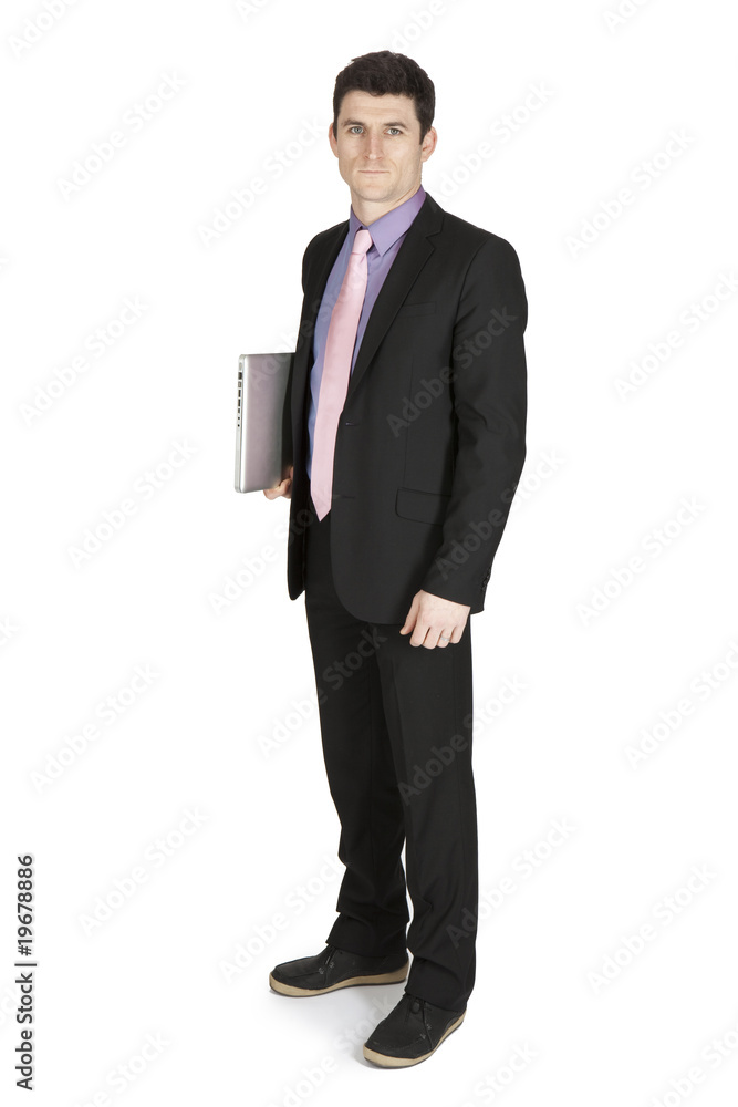 jeune cadre dynamique debout avec un ordinateur Stock Photo | Adobe Stock