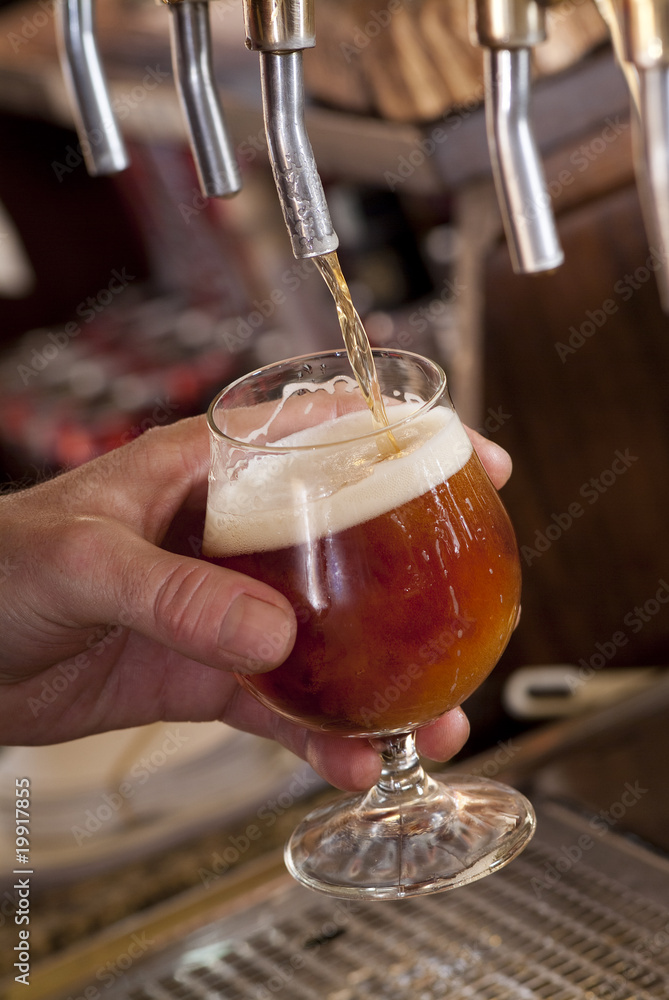 Bicchiere di birra alla spina Stock Photo | Adobe Stock