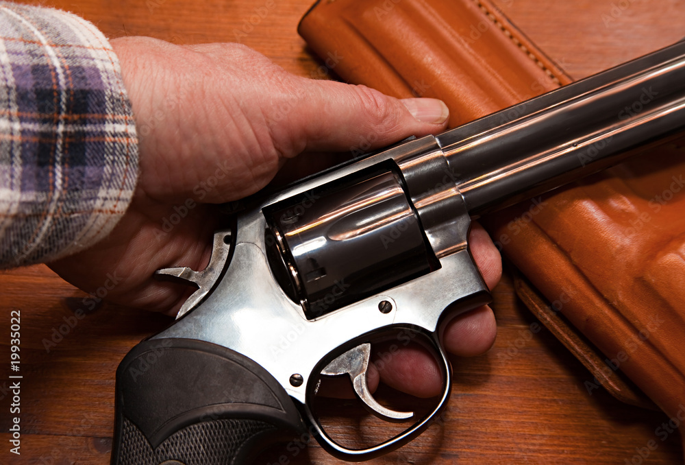 Männerhand mit Revolver Stock Photo | Adobe Stock