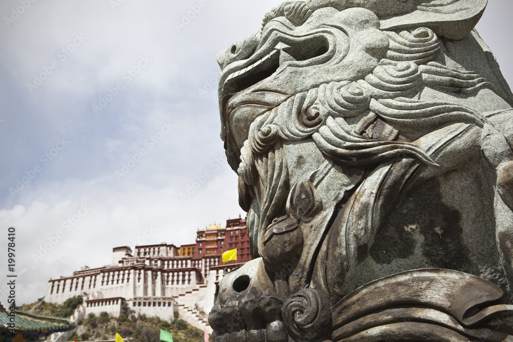 tibet: tone lion at the gate of potala palace Stock Photo | Adobe Stock