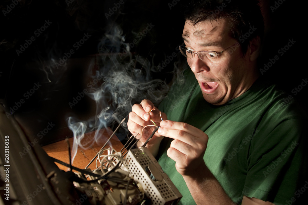 Funny electrician on fire Stock Photo | Adobe Stock