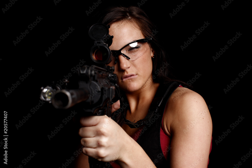 Sexy woman with rifle Stock Photo | Adobe Stock