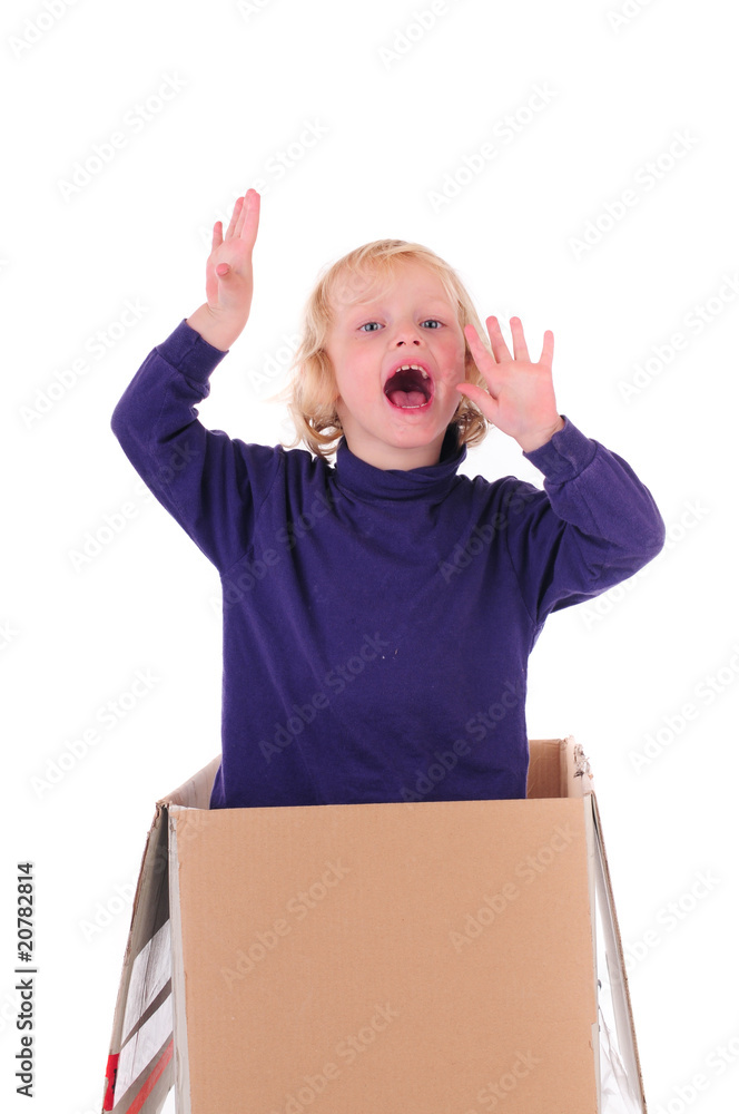 Kind im Karton Stock Photo | Adobe Stock