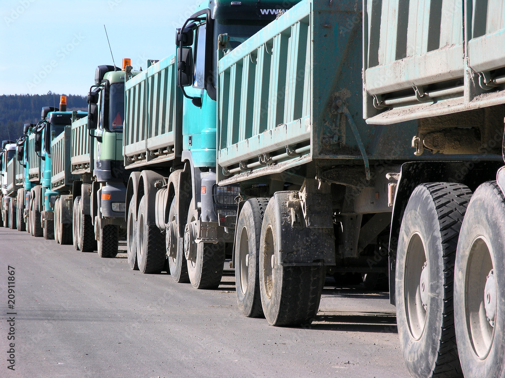 LKW Kolonne Stock-Foto | Adobe Stock