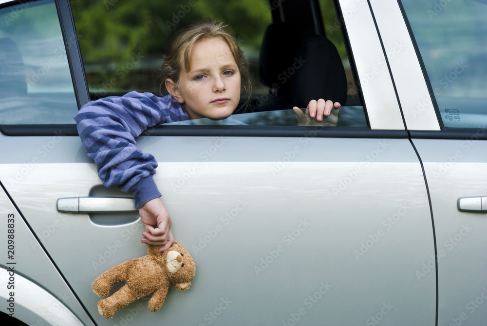 Sad girl in car Stock Photo | Adobe Stock