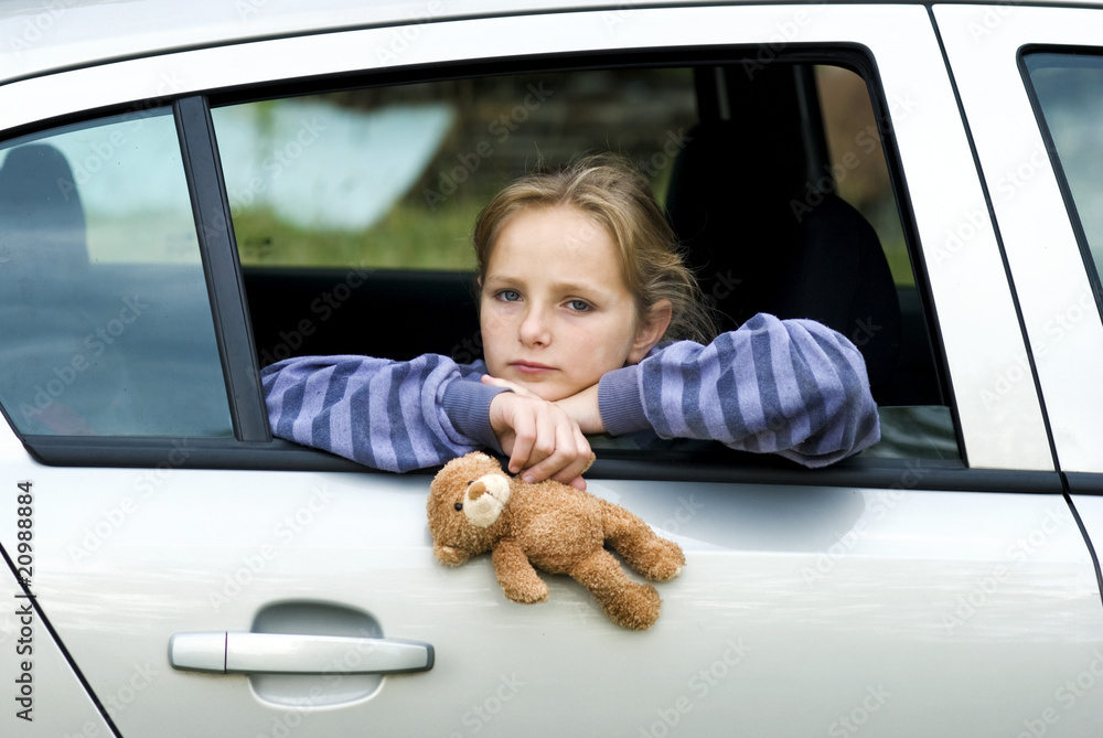 Sad girl in car Stock Photo | Adobe Stock