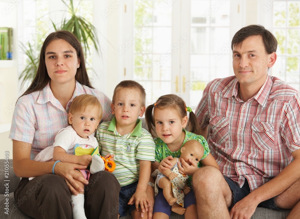 Portrait of nuclear family at home Stock Photo | Adobe Stock