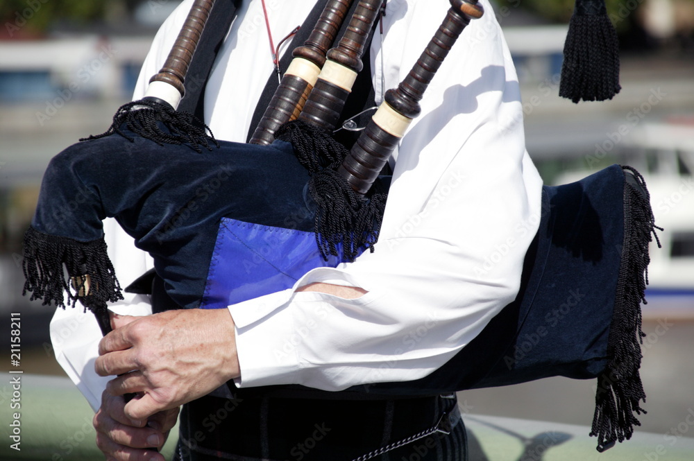 Piper playing traditional Scottish / Irish bagpipes Stock Photo | Adobe ...