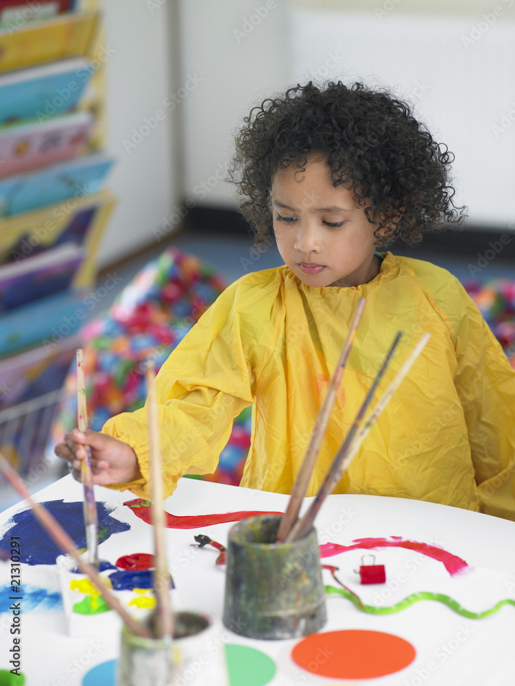 girl painting in art class elevated view Stock Photo | Adobe Stock