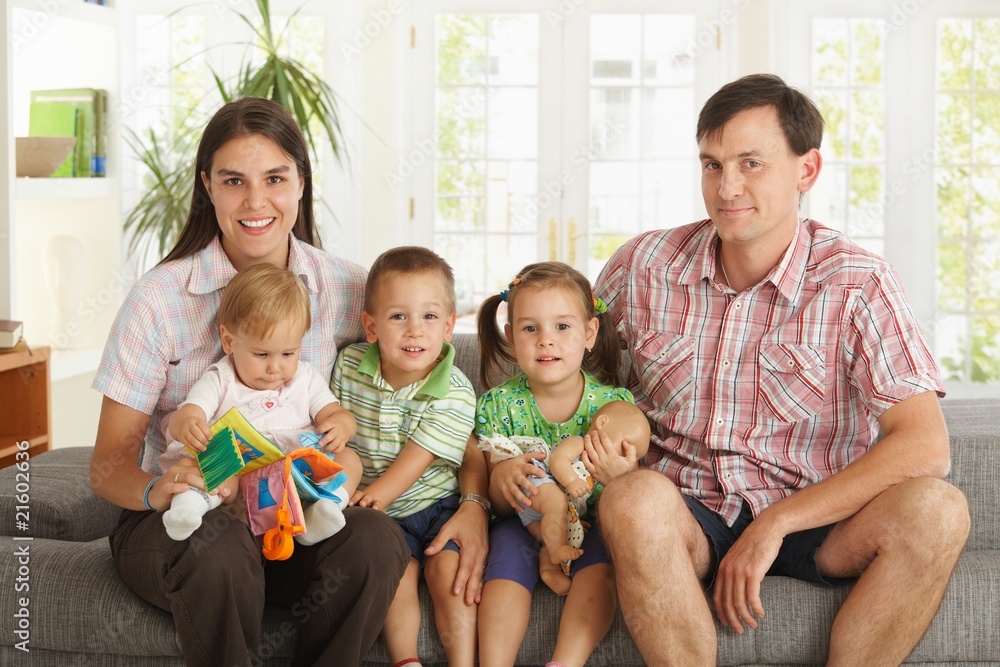 Portrait of nuclear family at home Stock Photo | Adobe Stock
