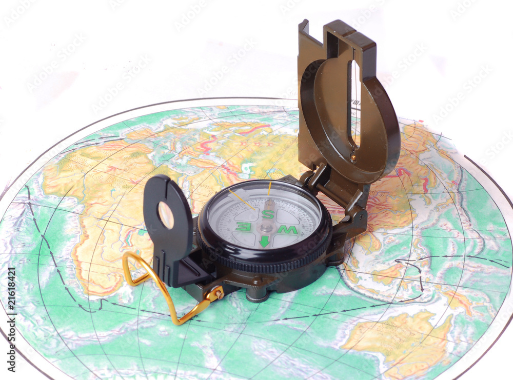 Compass and map of the world Stock Photo | Adobe Stock