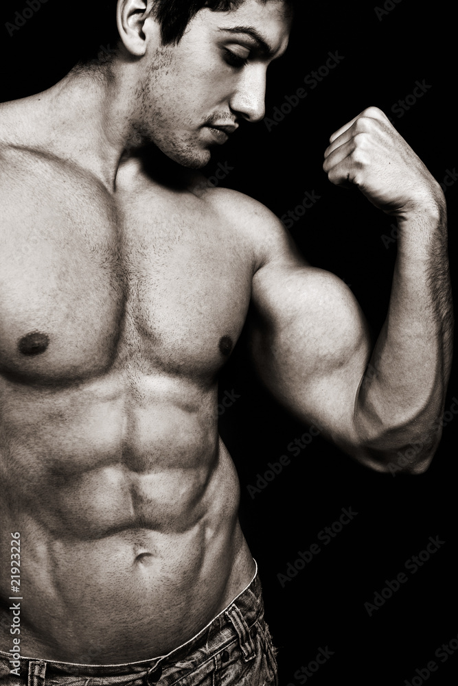 Sexy man with muscular biceps and abs Stock Photo | Adobe Stock