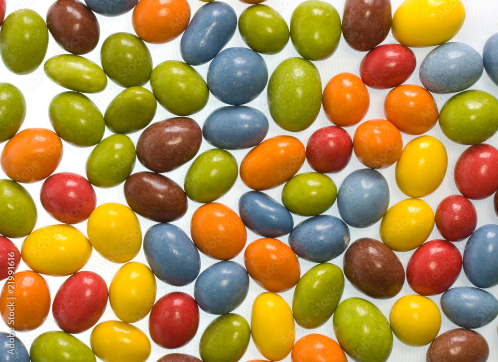 Candy coated chocolate peanuts background Stock Photo | Adobe Stock