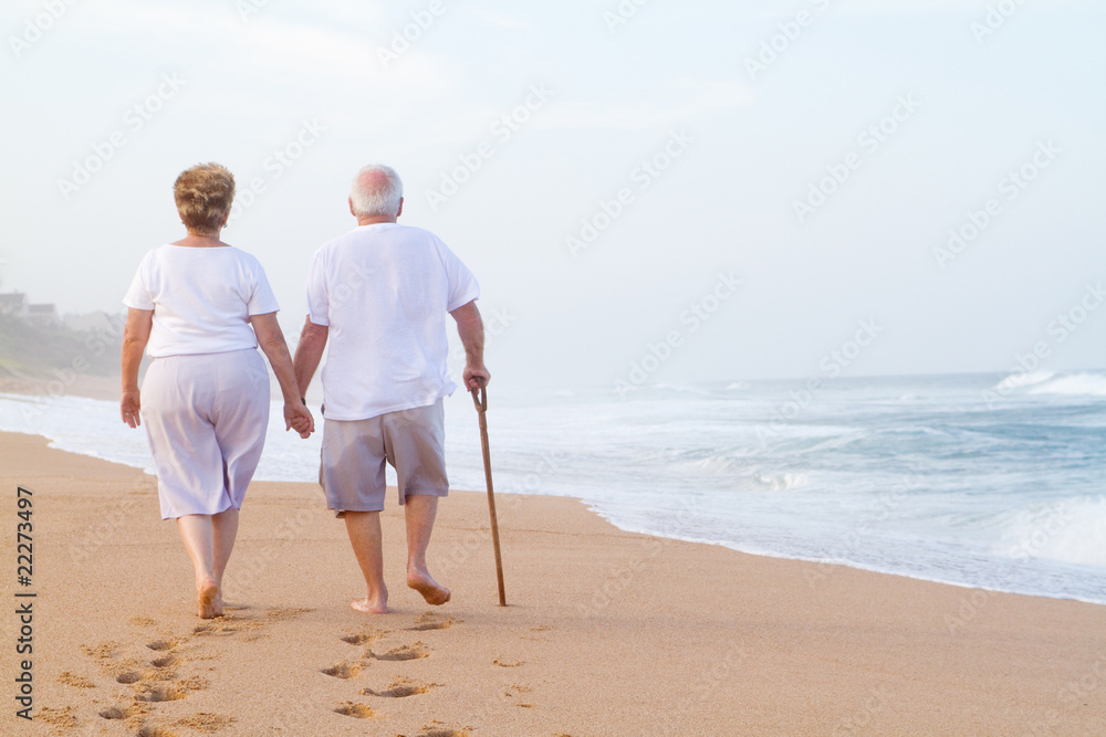 mature couple strolling hand in hand Stock Photo | Adobe Stock