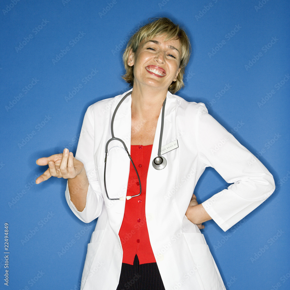 Doctor holding out hand. Stock Photo | Adobe Stock