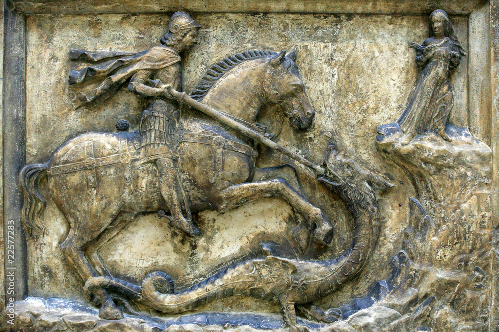 Medieval 16th century relief of St George and the Dragon Stock Photo ...