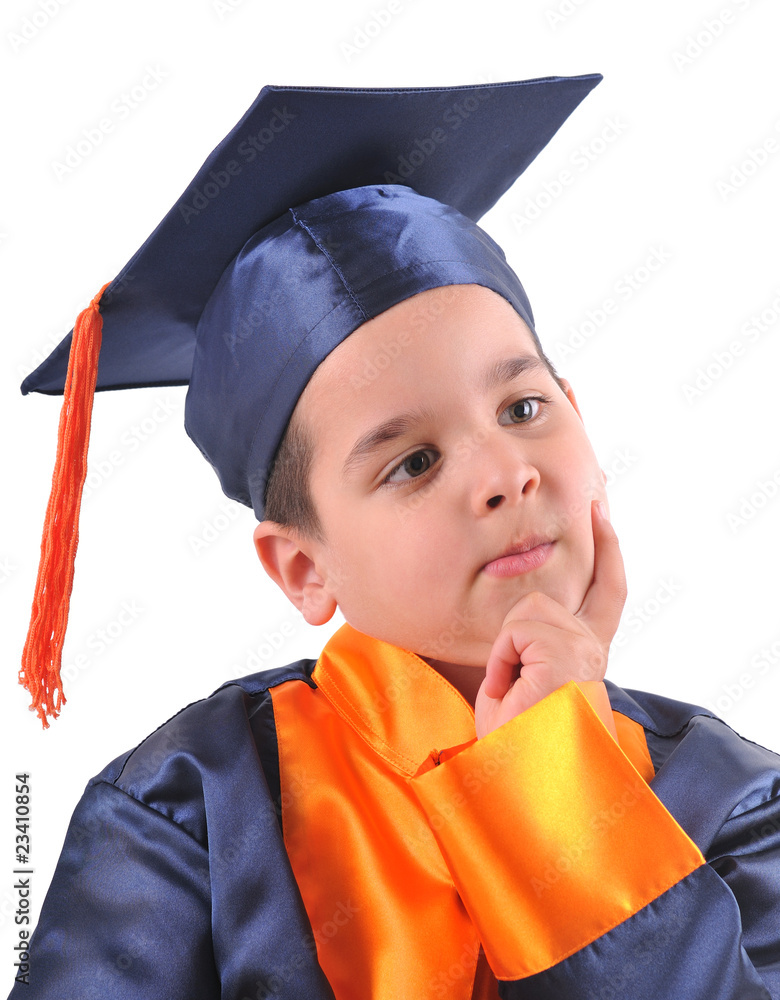 Cute boy in graduation uniform mimicking Stock Photo | Adobe Stock