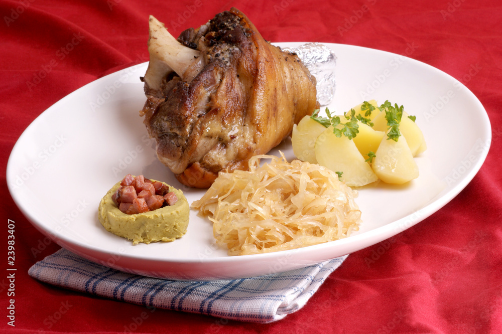 Eisbein und Sauerkraut mit Salzkartoffeln Stock Photo | Adobe Stock