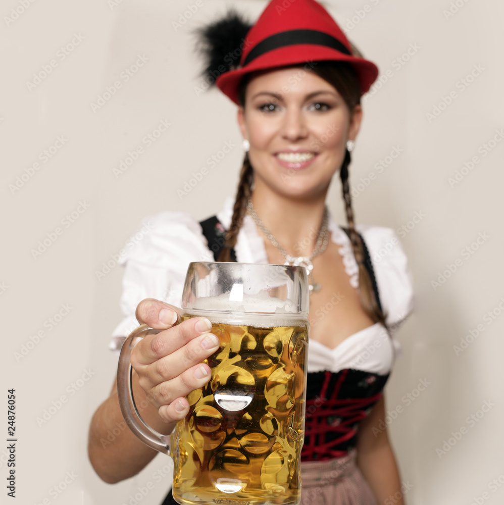 bayrisches Madl im Dirndl mit Bier Stock-Foto | Adobe Stock