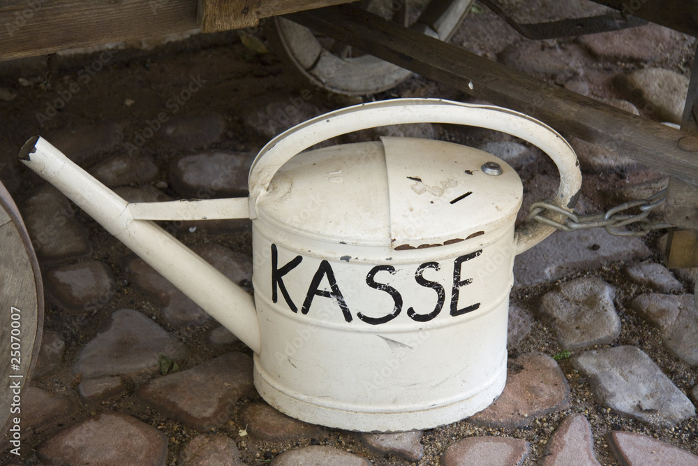 Gießkanne als Kasse Stock Photo | Adobe Stock